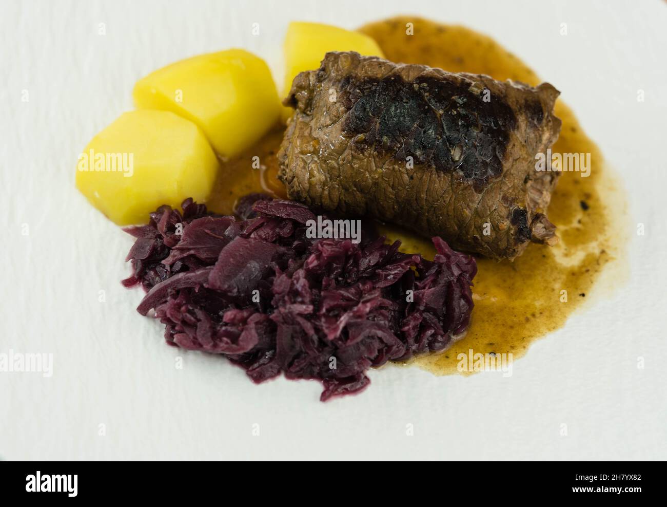 traditional german Food Beef Roulade with red cabbage Stock Photo - Alamy