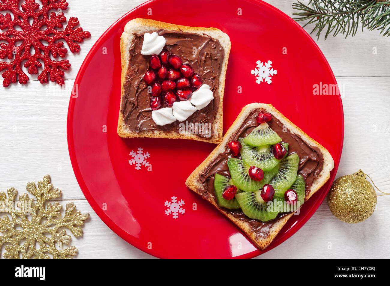 Creative festive sandwiches in the shape of a Christmas tree and Santa ...