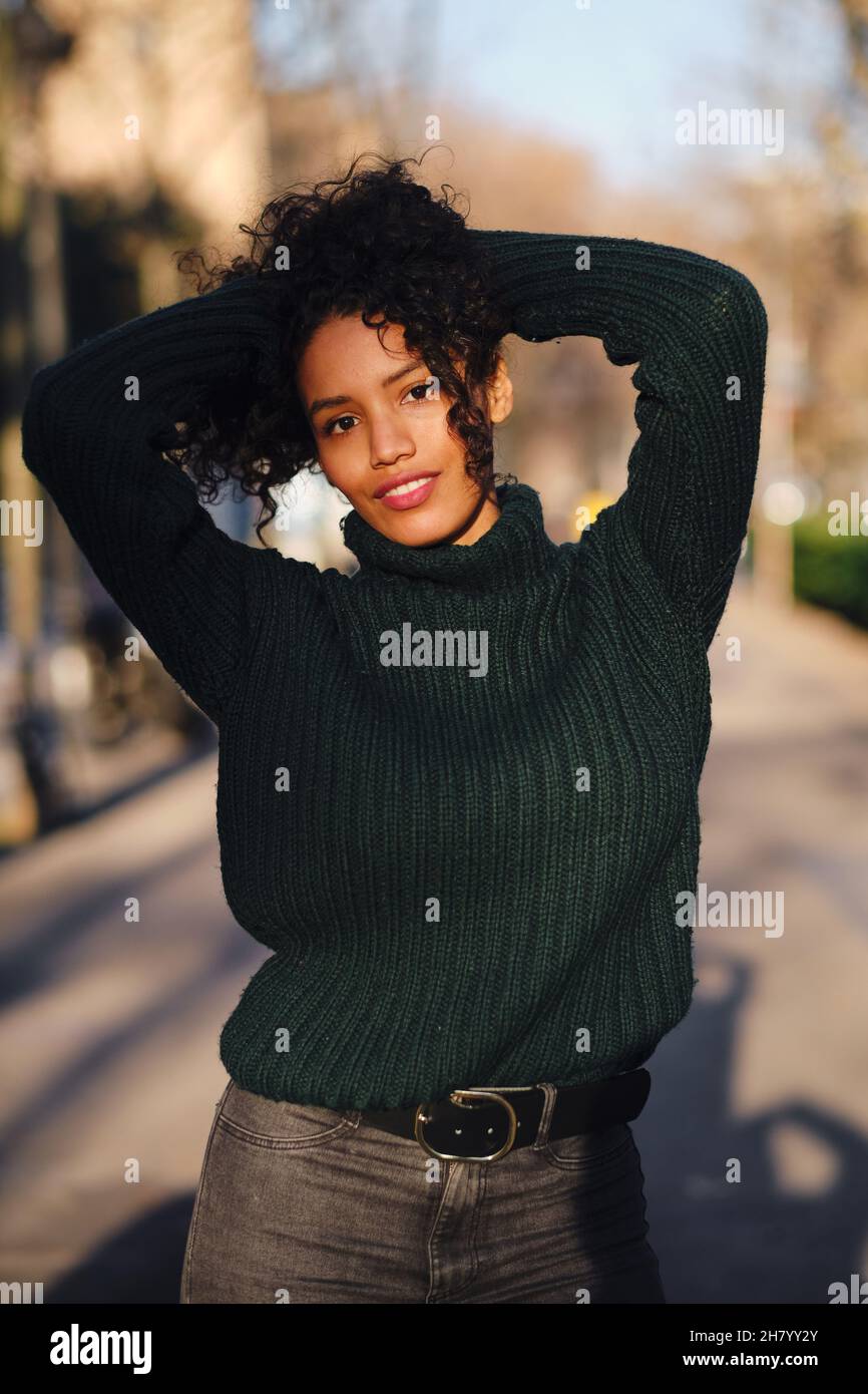 Woman posing outdoors hi-res stock photography and images - Alamy