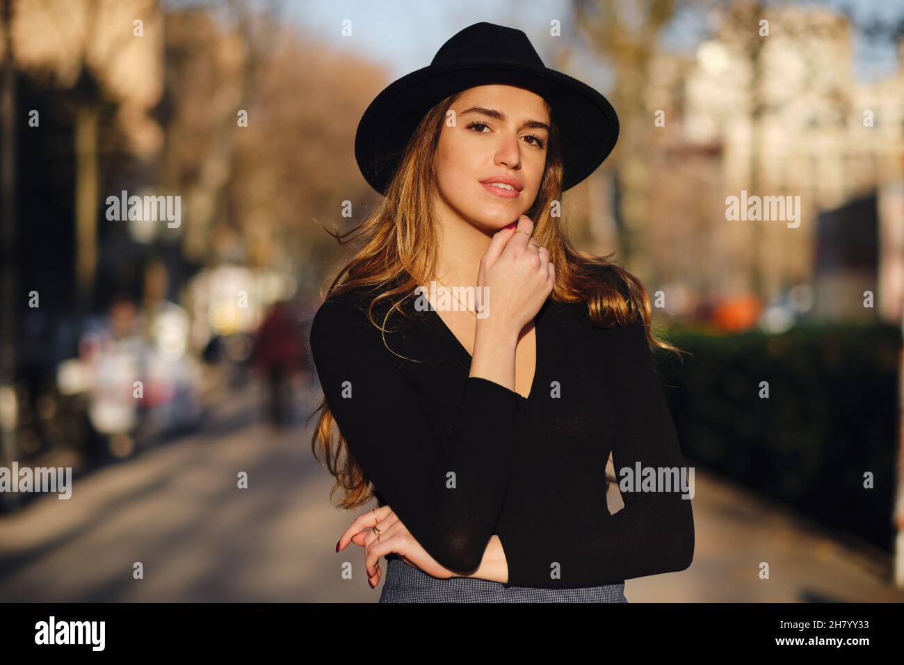Woman standing on outdoor street hi-res stock photography and images ...