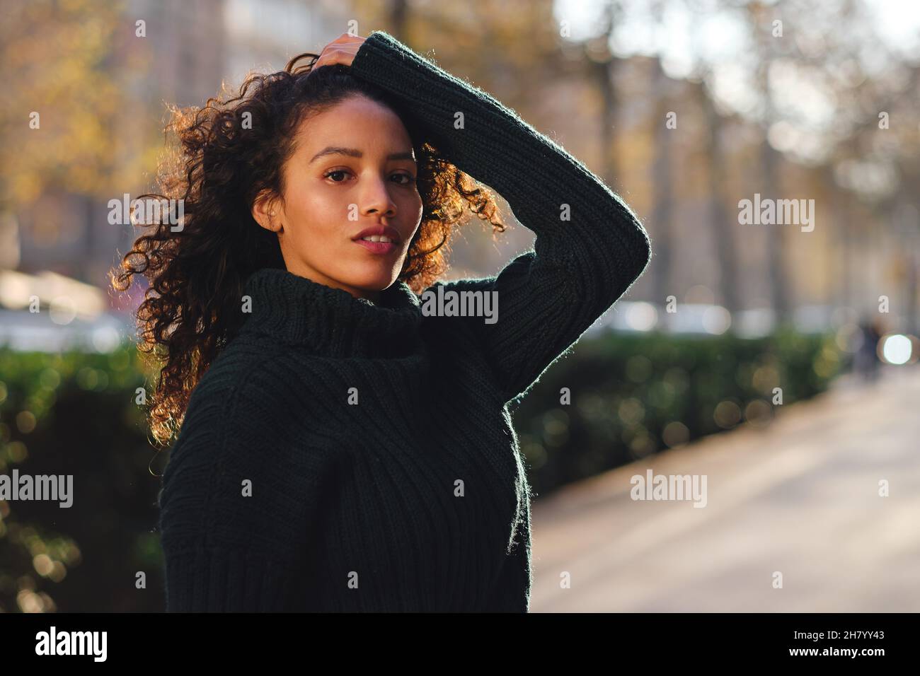 Woman posing outdoors hi-res stock photography and images - Alamy