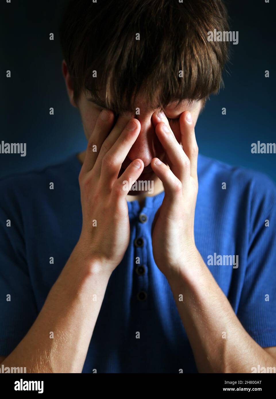 Sad and Tearful Man in the Dark Room Stock Photo - Alamy