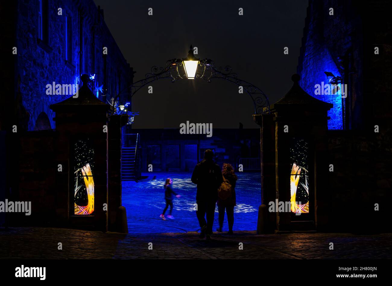 Castle of Light image projection in courtyard with family, Edinburgh ...