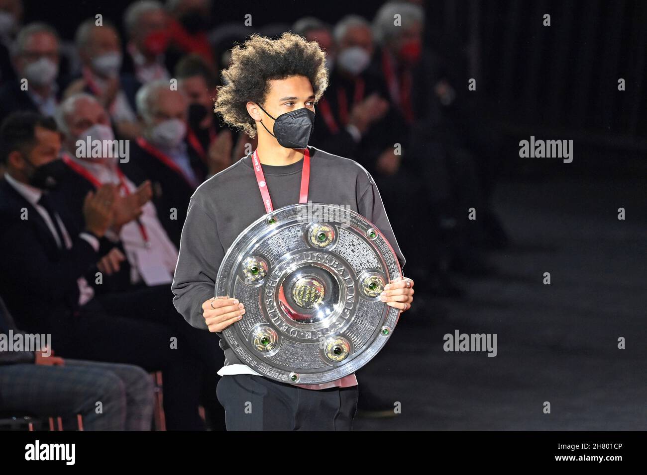Leroy SANE (FC Bayern Munich) carries the championship trophy, cup in ...