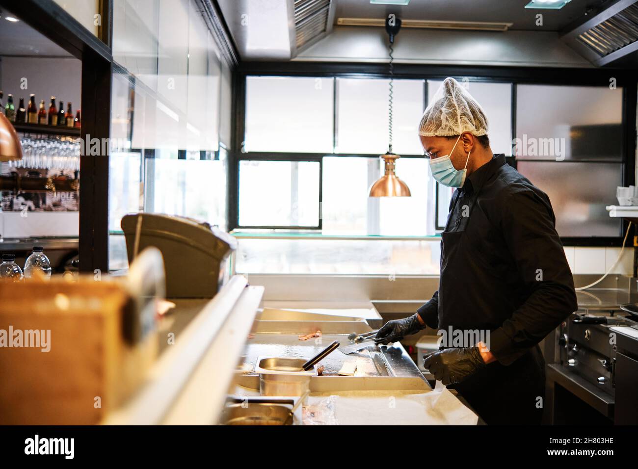 Kitchen staff uniform hi-res stock photography and images - Alamy