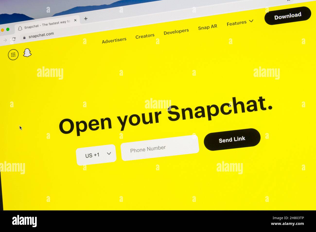 Snapchat website homepage with Open your Snapchat and US telephone ...