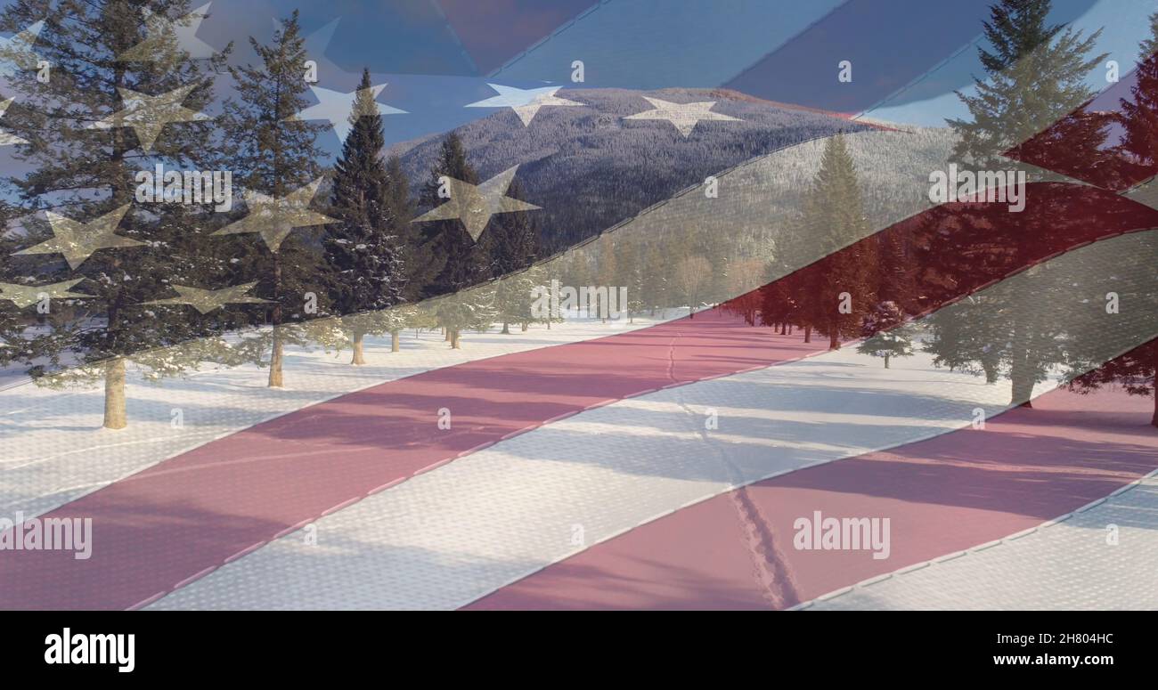 Image of american flag over snow covered forest and hill Stock Photo ...