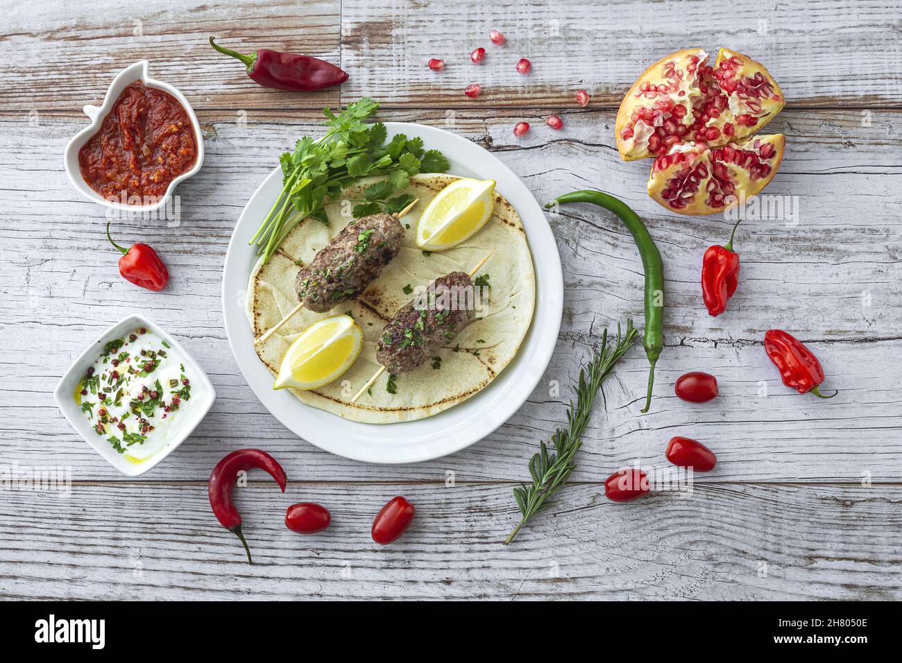 Traditional homemade kafta or kofta kebab beef and lamb with tomato ...