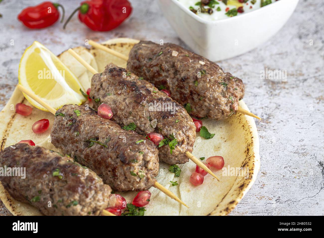 Traditional homemade kafta or kofta kebab beef and lamb with tomato ...