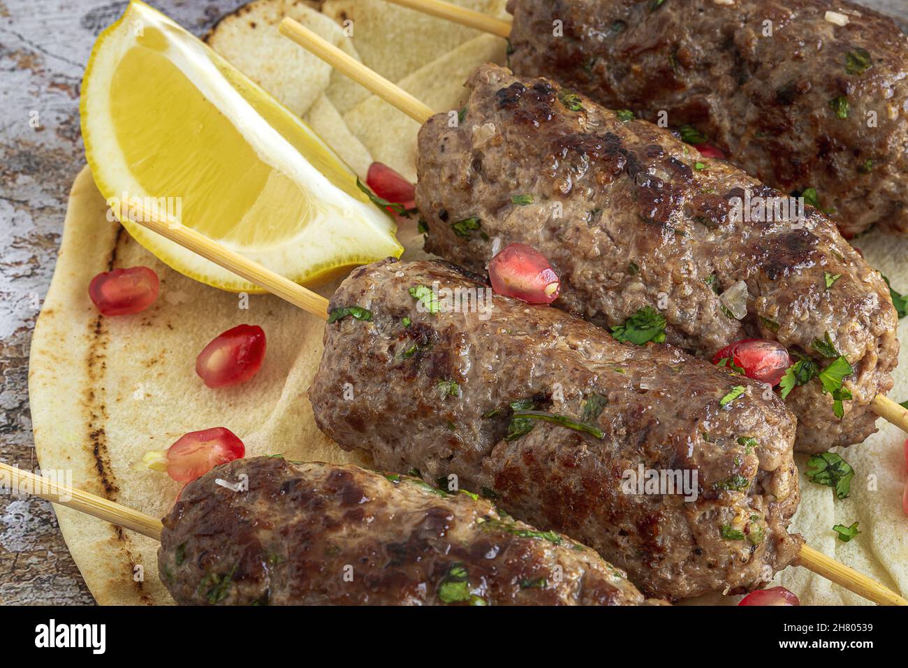 Traditional homemade kafta or kofta kebab beef and lamb with tomato ...