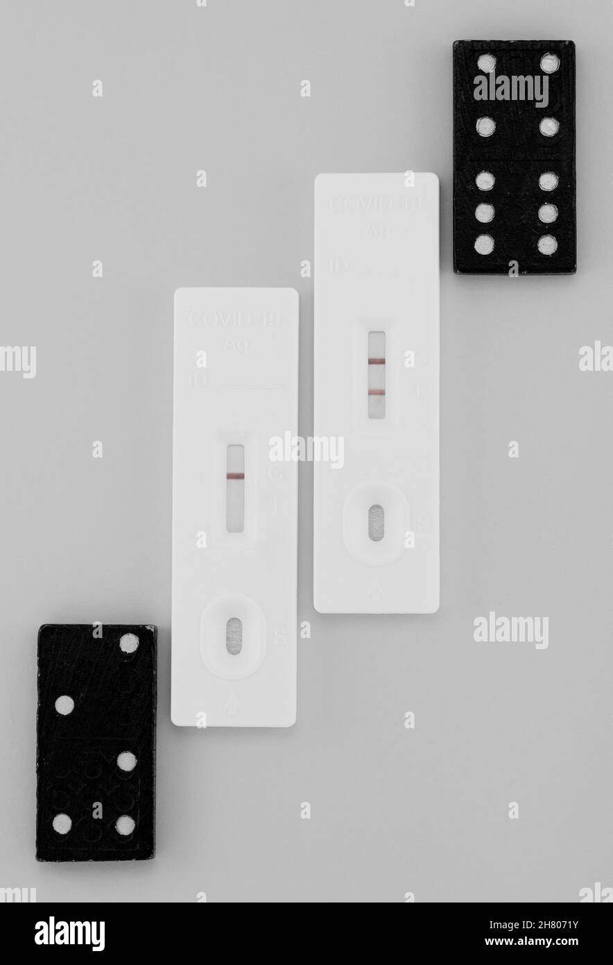 Two corona tests one positive and the other negative on white ...