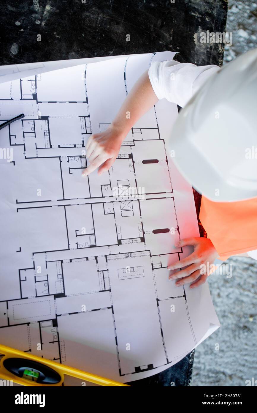 Architect working over plan. Closeup Desk With blueprints drawing Stock ...