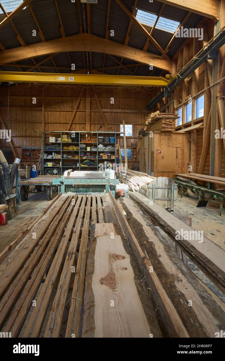 View Into A Sawmill Workshop With A Full Milling Machine A Pile Of ...