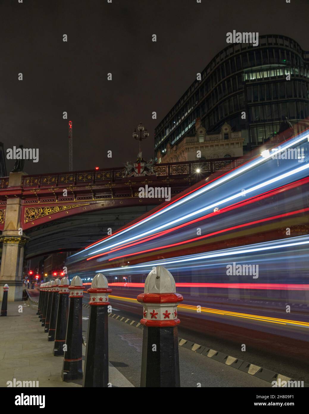 Holborn Viaduct bus trails Stock Photo - Alamy