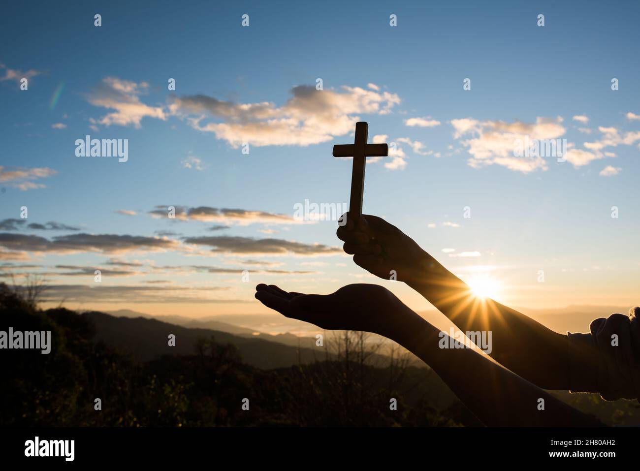 Hold cross hi-res stock photography and images - Alamy