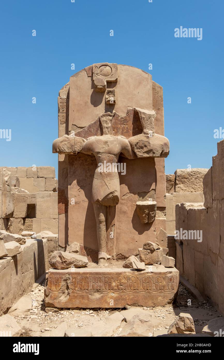 Statues in Karnak Temple, Egypt. The Karnak Temple Complex consists of ...