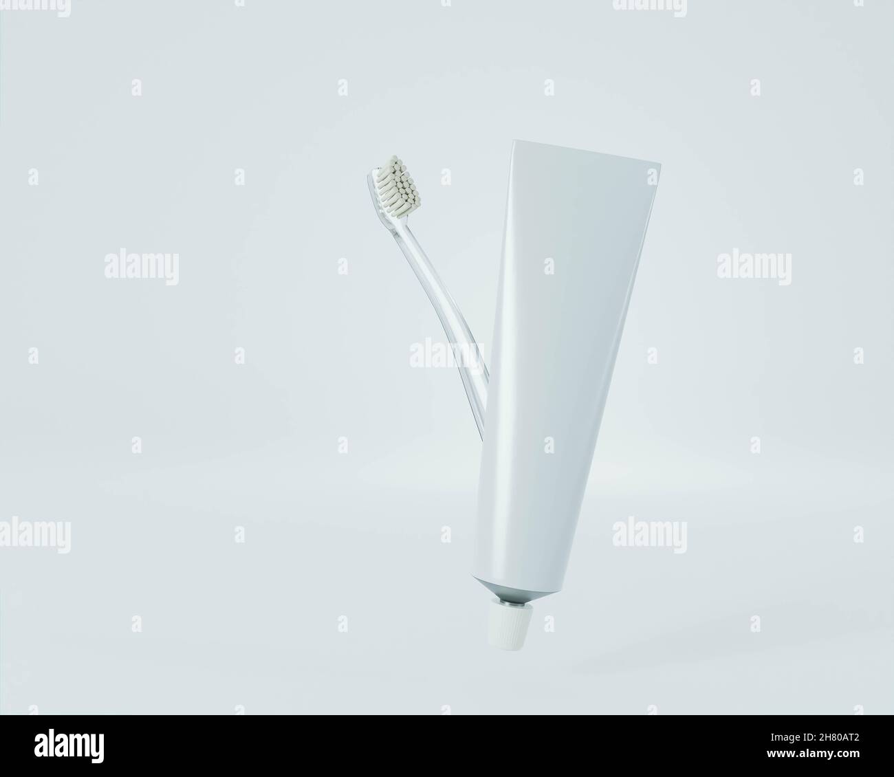 Toothbrush and toothpaste on white background Stock Photo - Alamy
