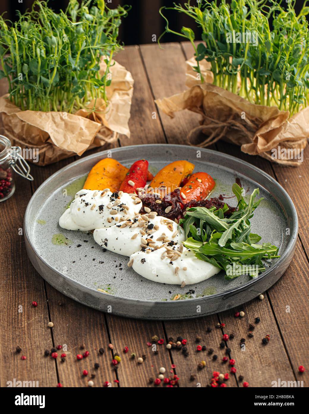 Baked bell pepper with feta cheese mousse salad Stock Photo - Alamy