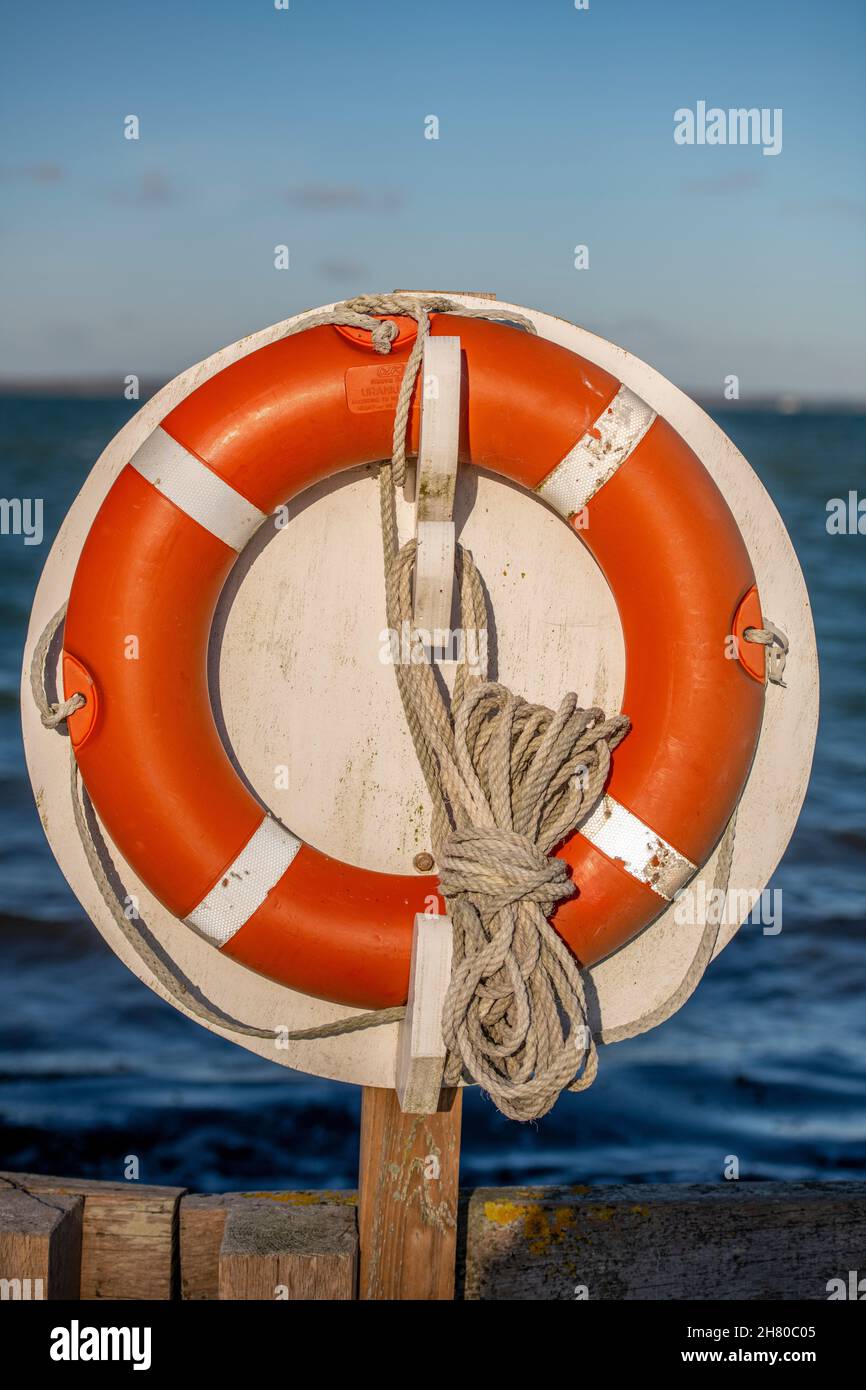 the coast, safety at sea, perrybuoy on stand, orange lifebuoy on a ...
