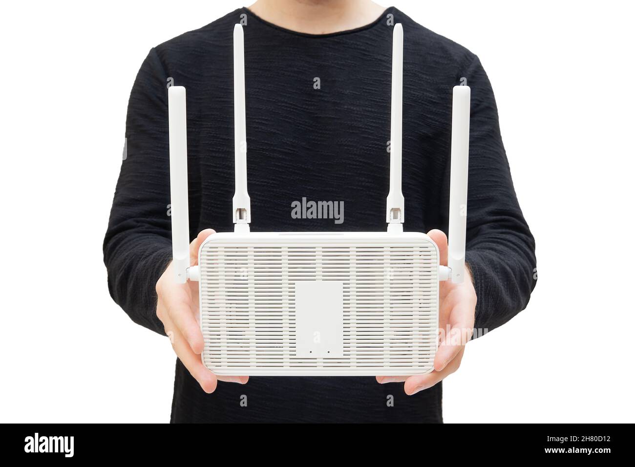 Man wearing a black long sleeve holding a modern dual band wi-fi 6 ...