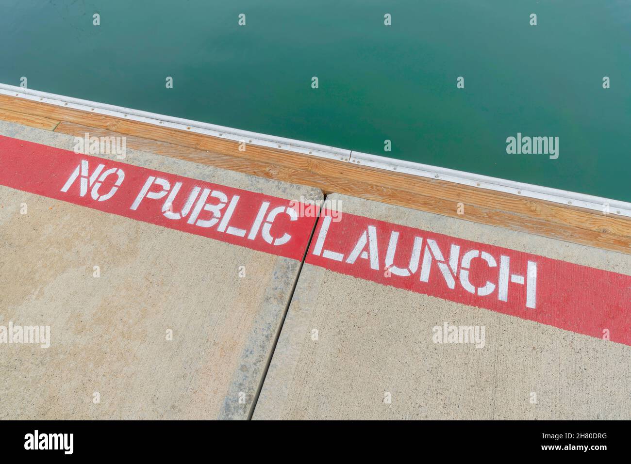 Painted signage on a concrete dock at Oceanside, California Stock Photo ...