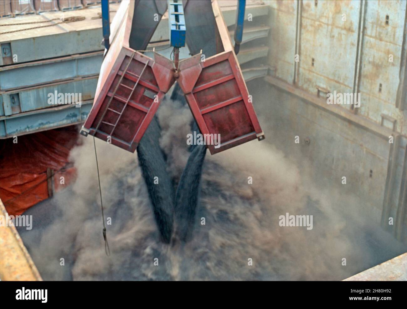 Cinder being loaded in the Port of Harburg Stock Photo - Alamy