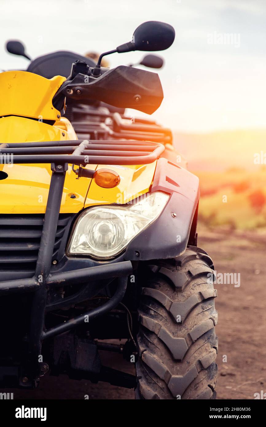 ATV quad bike on forest offroad, front view, sunlight Stock Photo - Alamy