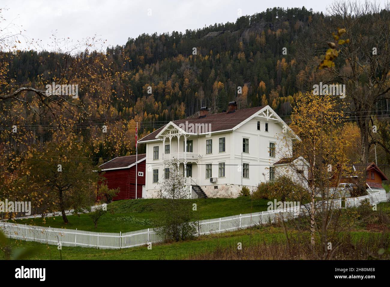 NORESUND, NORWAY - Oct 24, 2021: A house at the coast of lake Kroderen ...