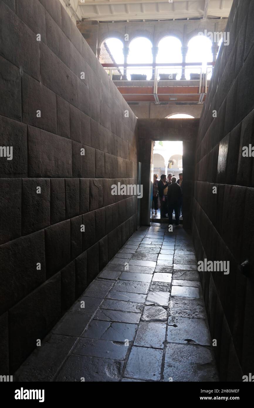 Cuzco Peru centre of town corridor dark dingy place old ancient wall ...