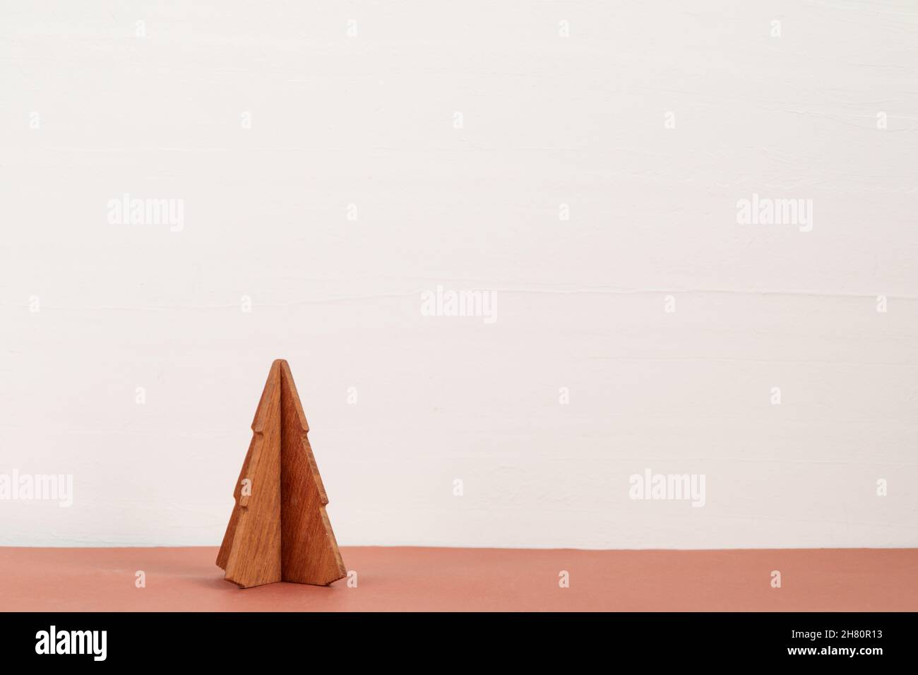 Christmas tree wooden pyramid against white background with empty space ...