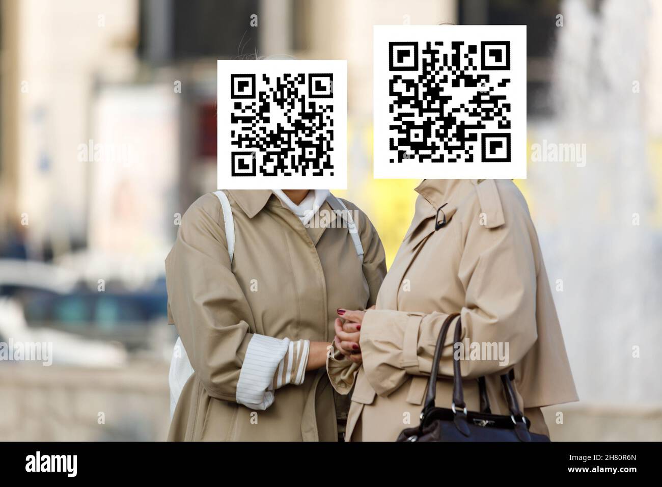 qr code on the faces of people in the city. High quality photo Stock ...