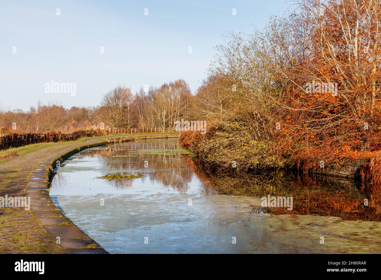 The Manchester, Bury and Bolton canal at Nob End on a November's day in ...