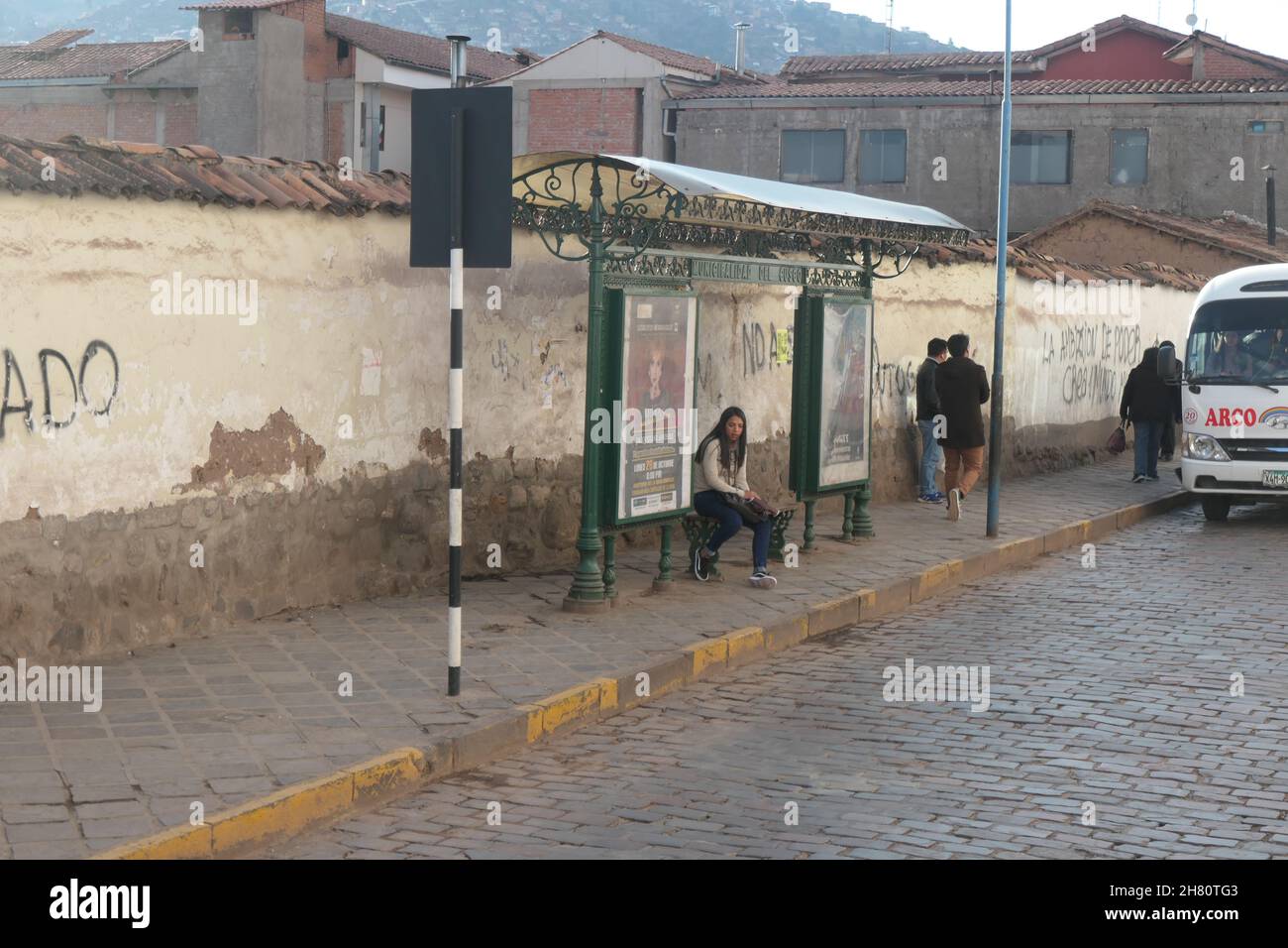 Girl sitting at bus stop hi-res stock photography and images - Alamy
