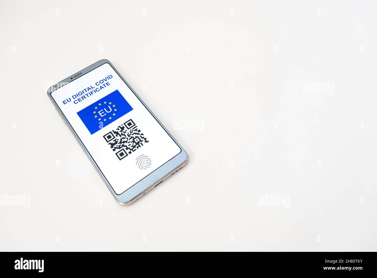 A smartphone with EU Greenpass digital covid certificate with dummy QR ...