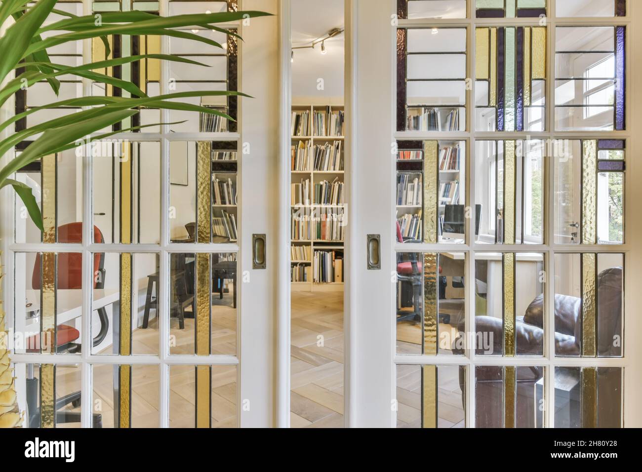 Wooden doors with many windows with a library in the background Stock ...