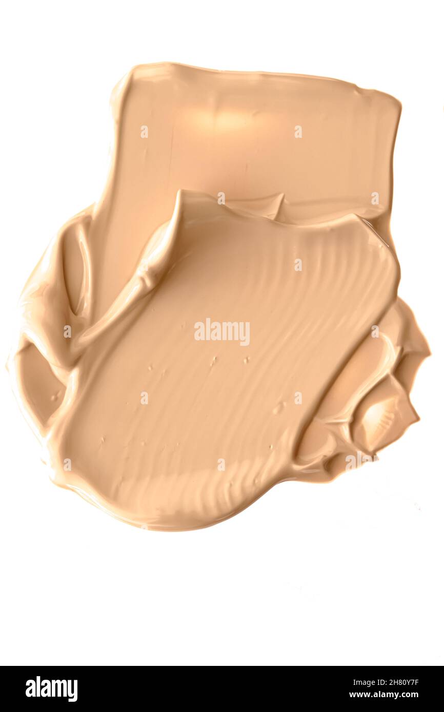 Beige beauty cosmetic texture isolated on white background, smudged ...