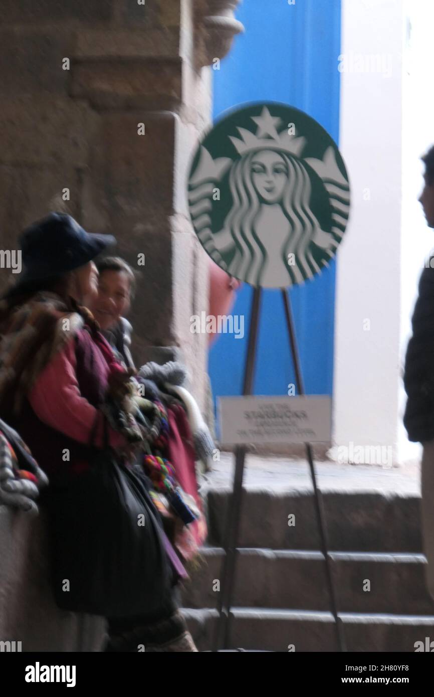 Restaurant in Cuzco Peru centre of town sign signs outside front door ...