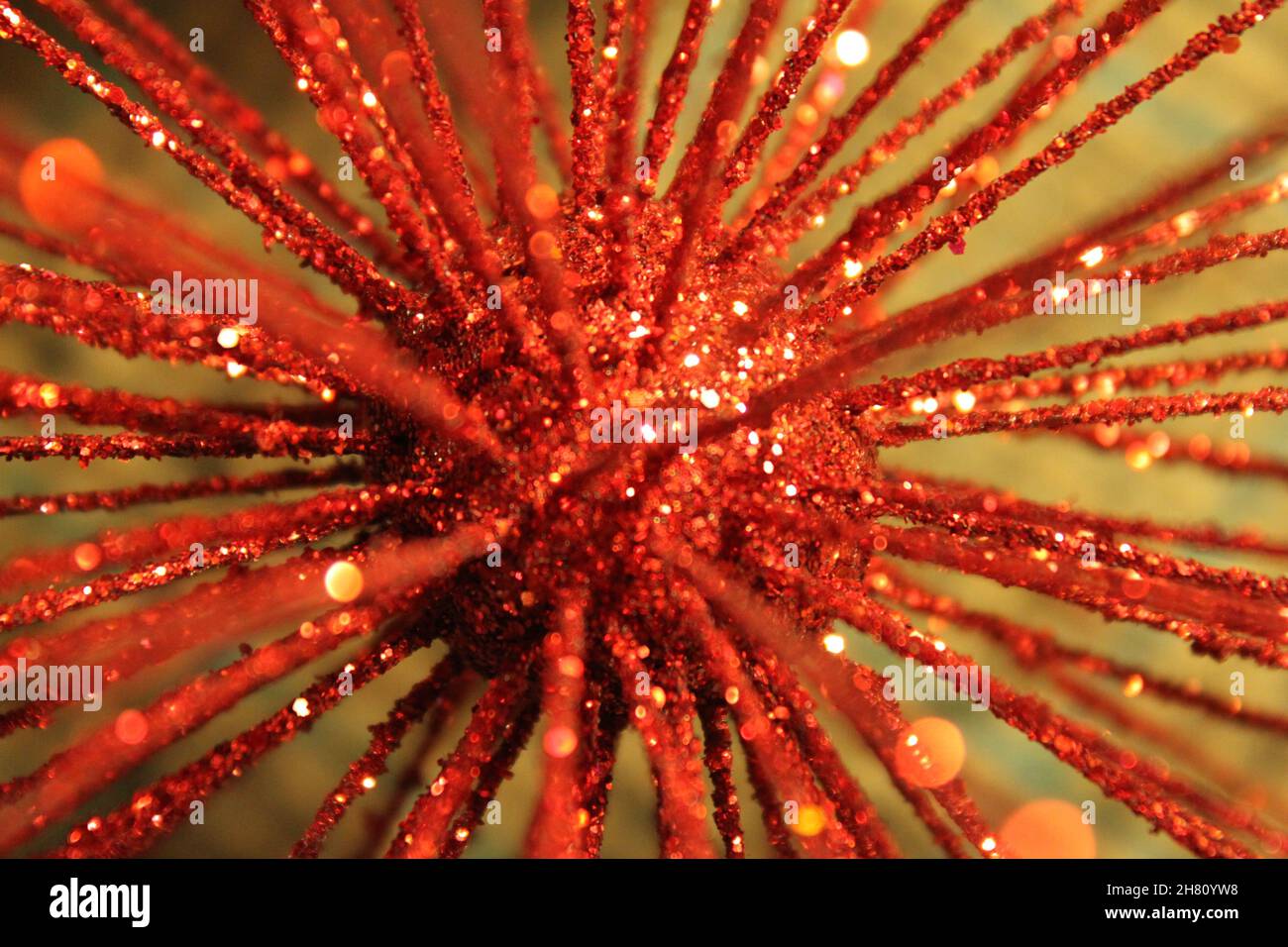 Red ball with glitter rays Stock Photo - Alamy