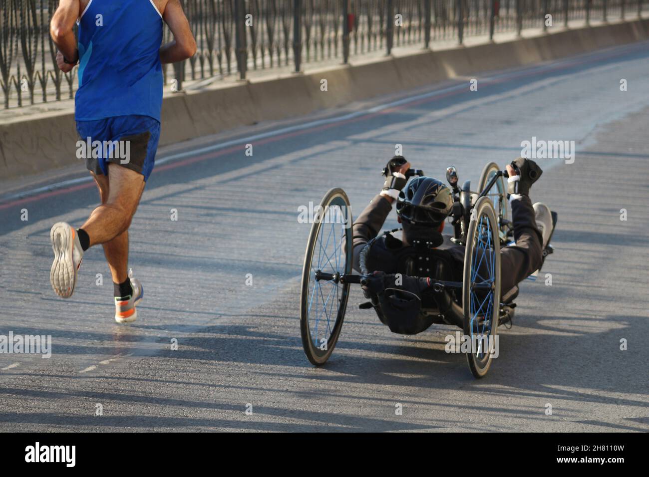 Run marathon including handicapped runner Stock Photo - Alamy