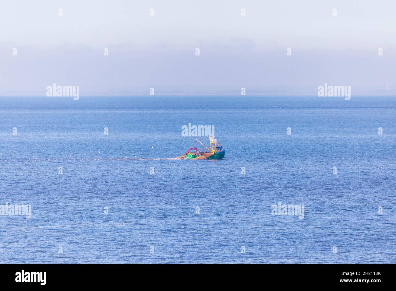Single Fishing Boat off Hunstanton Trawling on The Wash during a Bright ...
