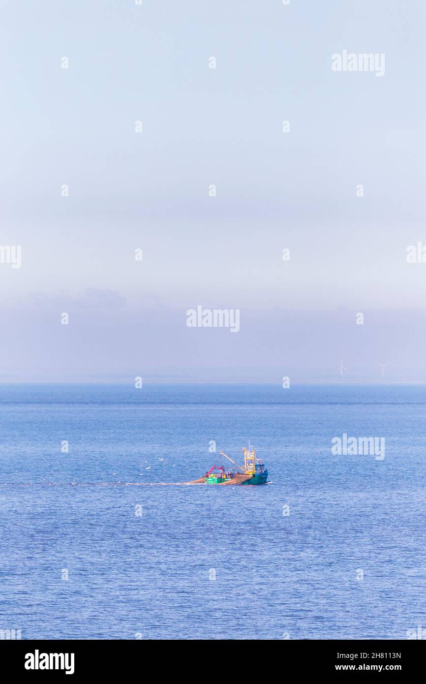 Single Fishing Boat off Hunstanton Trawling on The Wash during a Bright ...