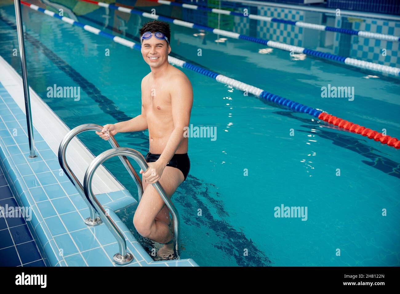 Swimming pool action stroke splash breathing hi-res stock photography ...