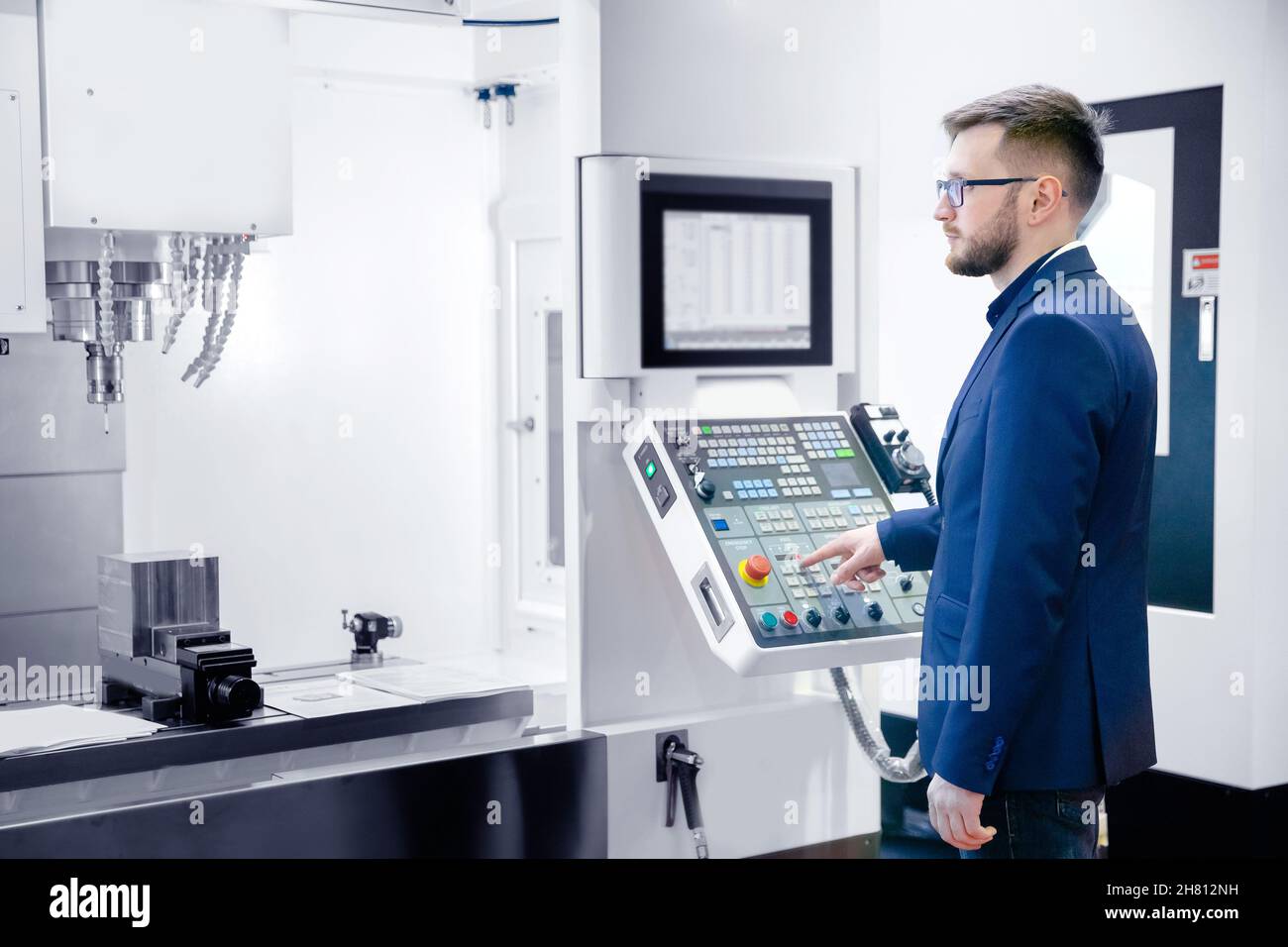 Worker entering data machine hi-res stock photography and images - Alamy