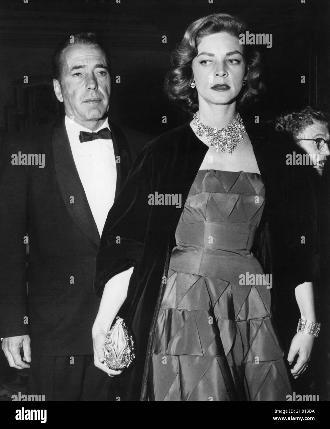 HUMPHREY BOGART and his Wife LAUREN BACALL arriving at the 27th Academy ...