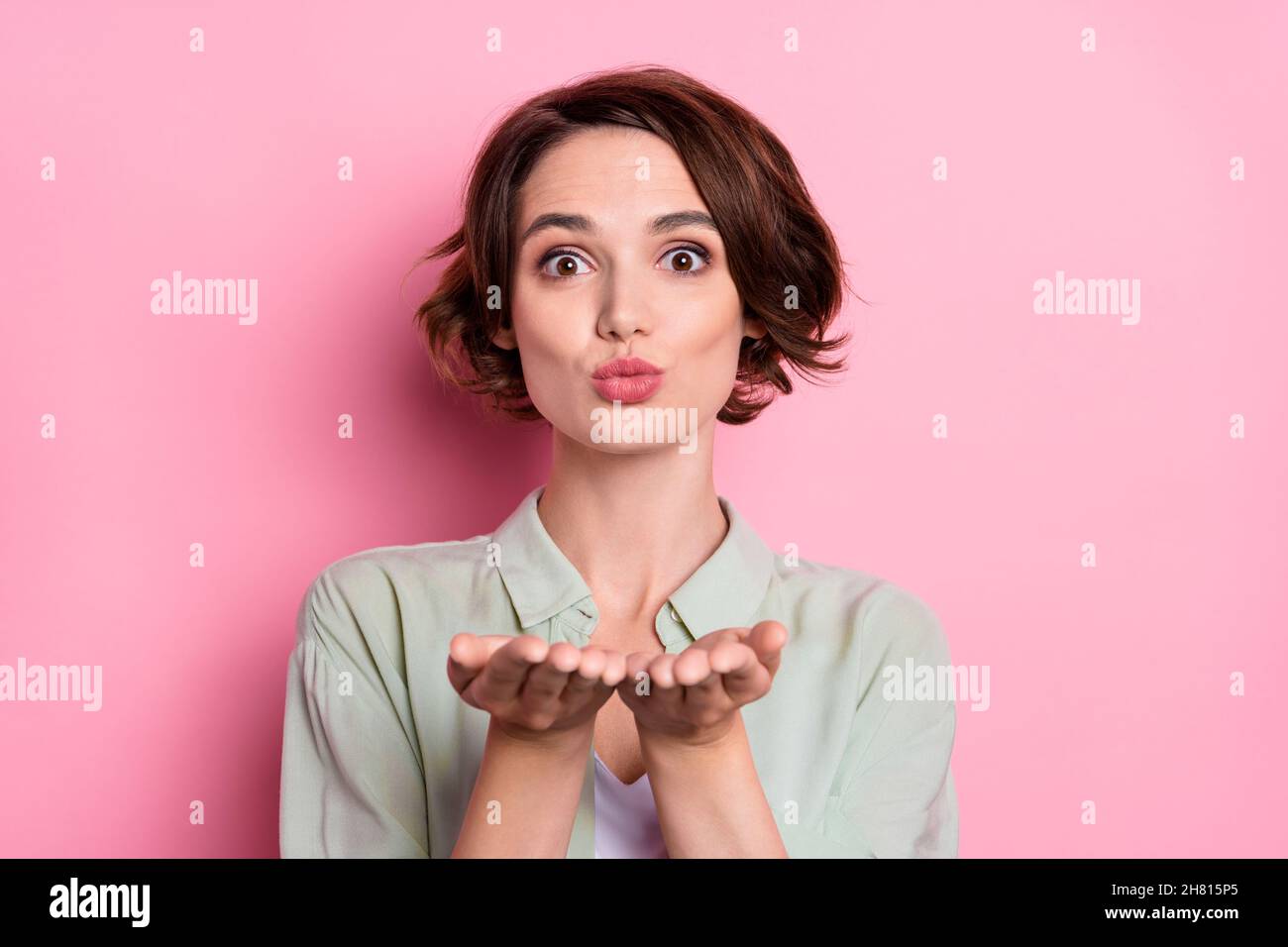 Portrait Of Attractive Cheerful Amorous Brown Haired Girl Sending Air