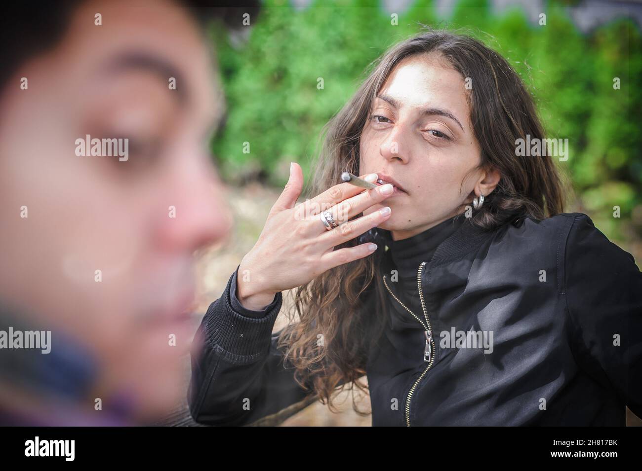 Young couple smoking cannabis in hi-res stock photography and images ...