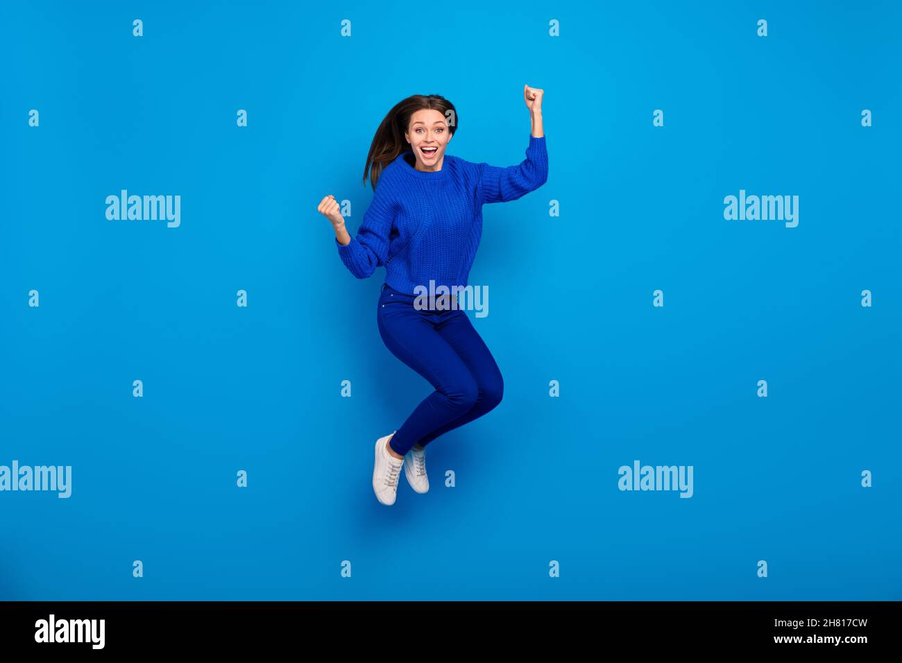 Full length body size view of attractive cheery lucky girl jumping ...