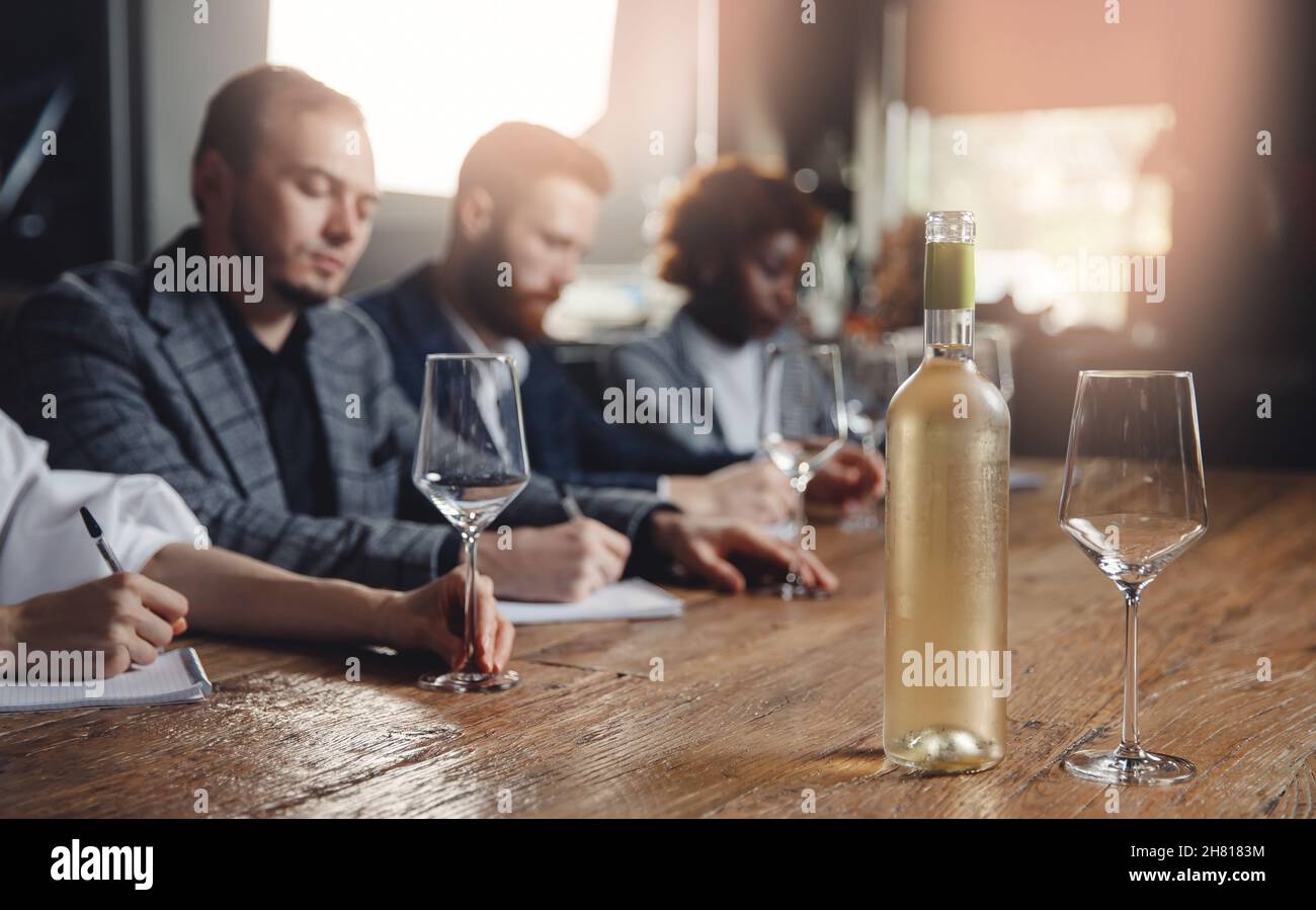 Training of restaurant staff, studying wine list Stock Photo - Alamy