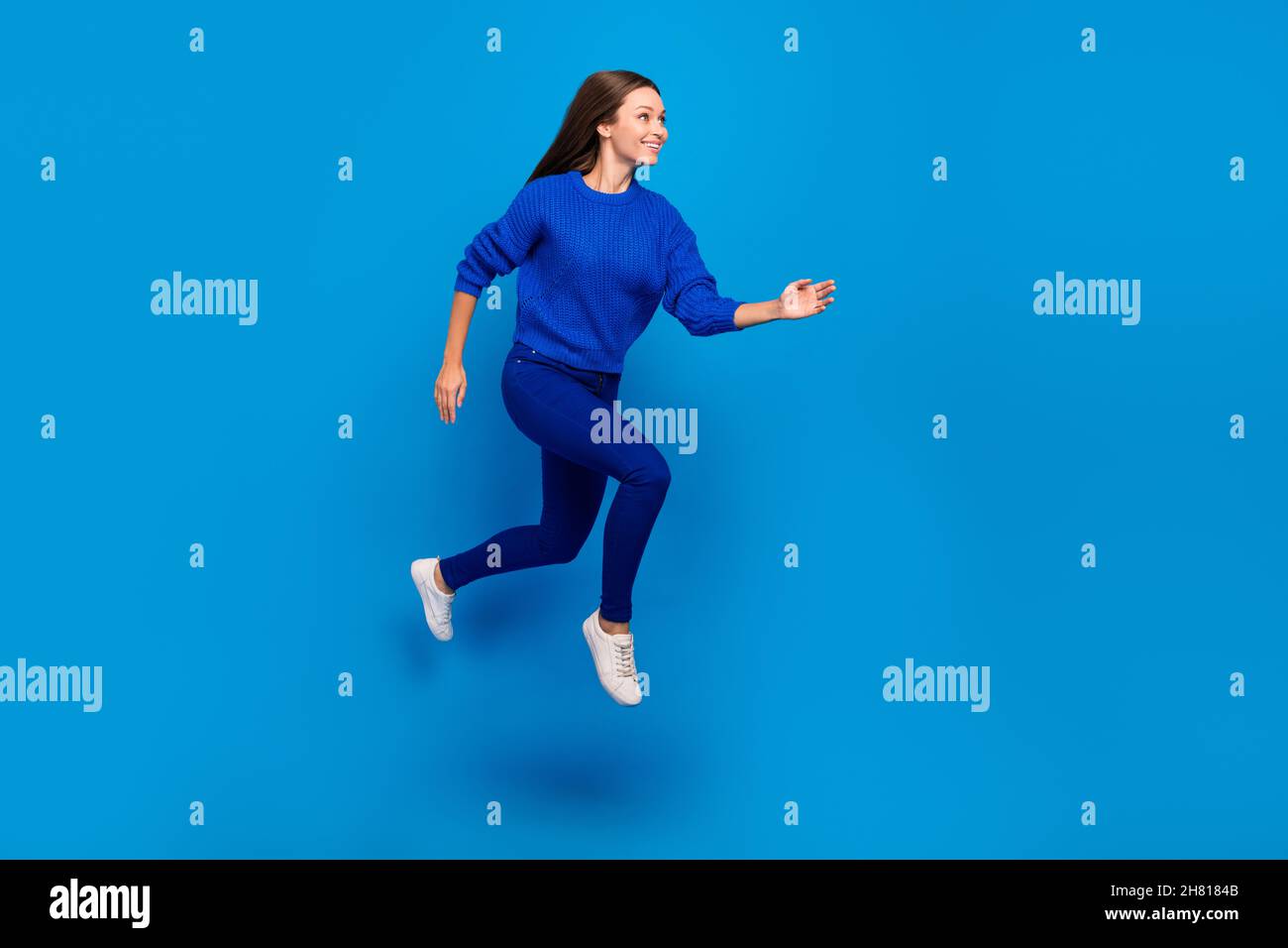 Full length body size view of attractive cheerful carefree girl jumping ...
