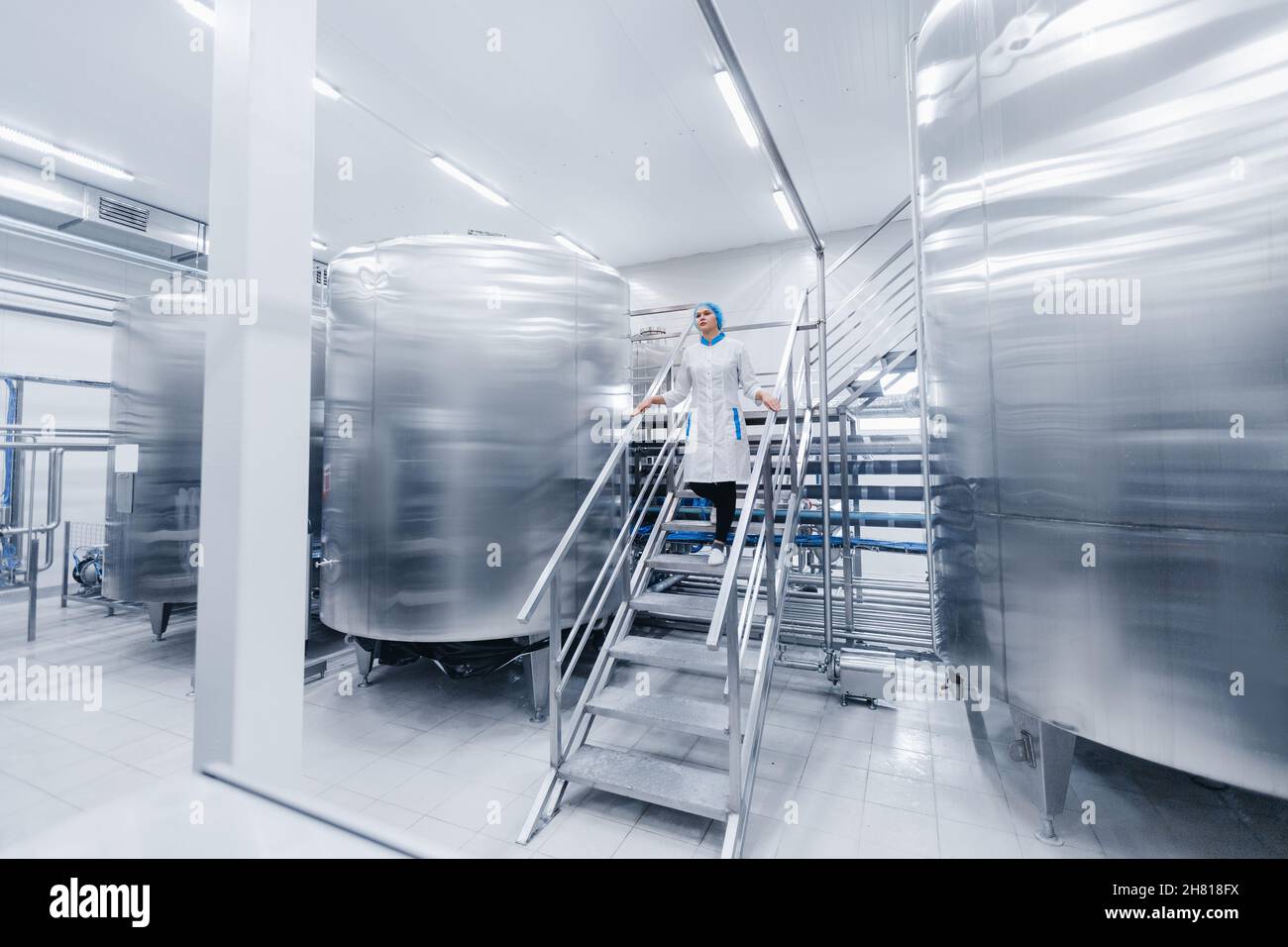 Woman milk factory smile hi-res stock photography and images - Alamy